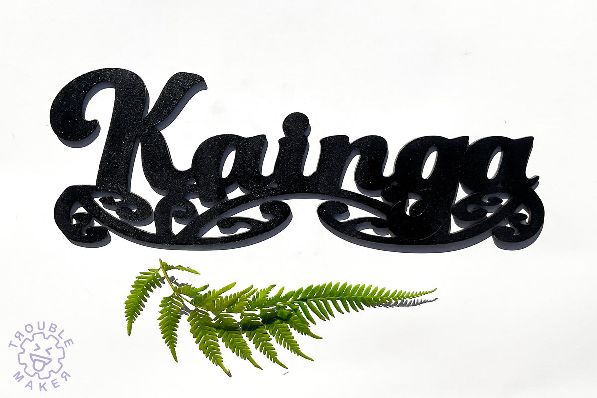 Kainga sign art, carved of wood– TroubleMaker.co.nz
